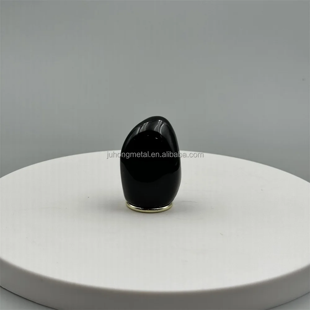 Perfume cap side view showing shiny finish