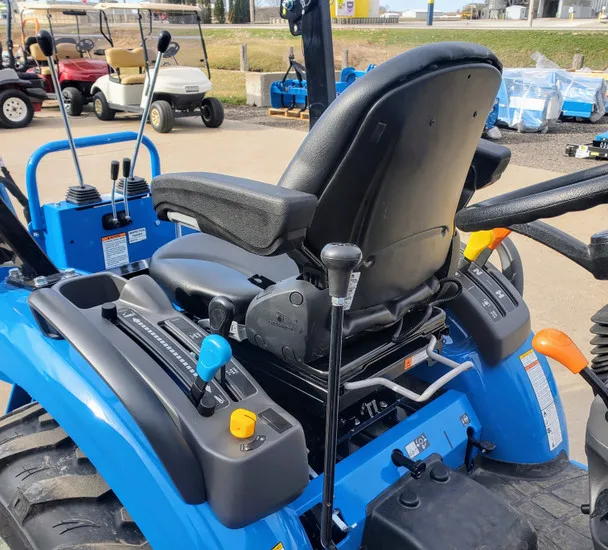 23HP LS Lawn Mower With Front Loader and Backhoe Implements Attached ...
