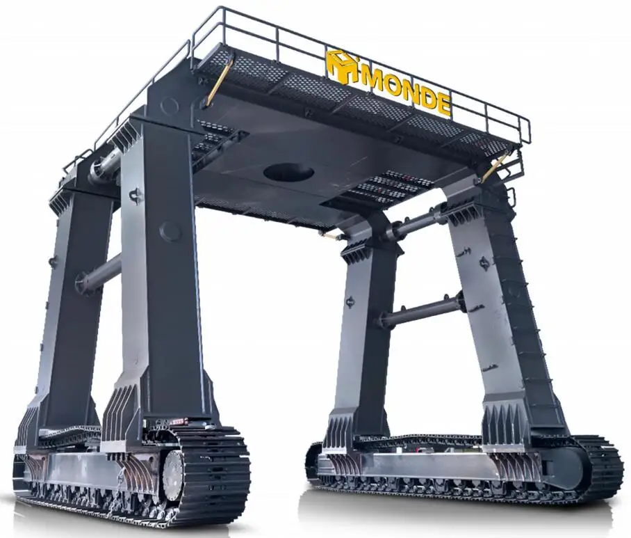 MONDE Higher Reach Excavator Attachment - Unloading Straddle Carrier