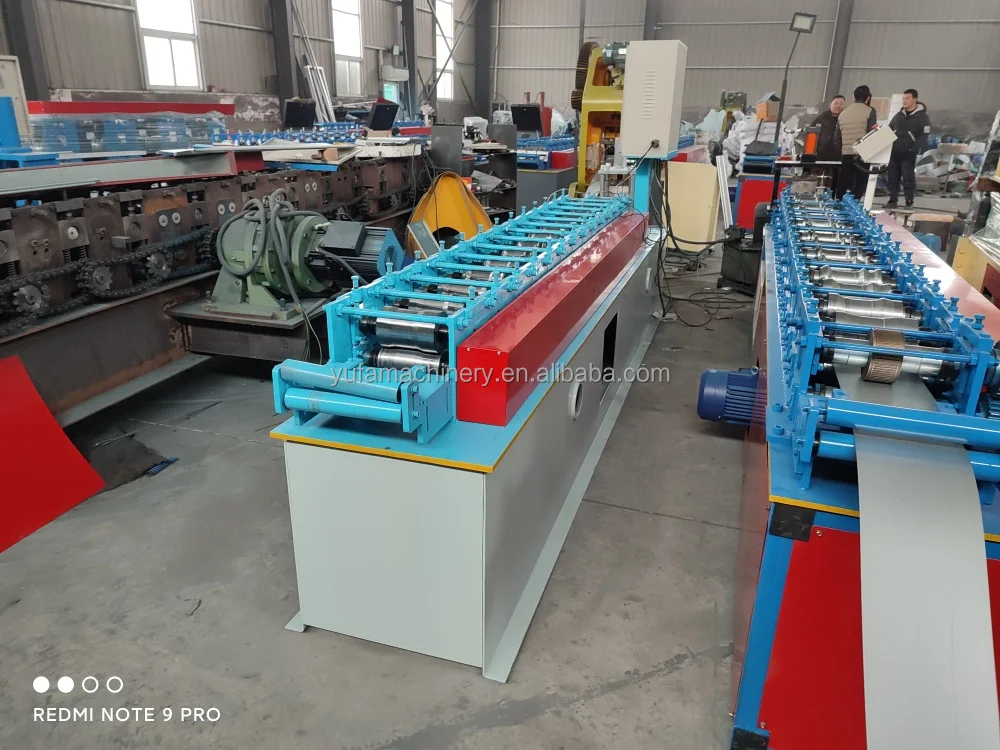 Spring Type Galvanized Metal Shutter Door Roll Forming Machine Used for ...