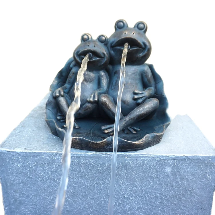 Frog fountain statue of frogs on a lily pad with water spouting solar ...