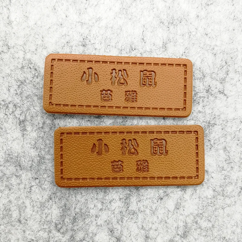 Custom Logo Debossed Garment Label Tags - Faux Leather Glitter