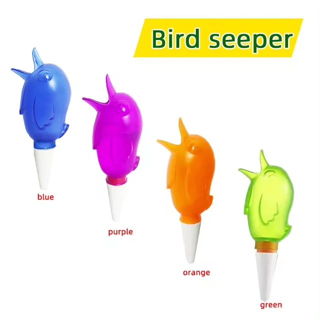 Indoor And Outdoor Plants With A Colored Bird-shaped Lazy Watering ...