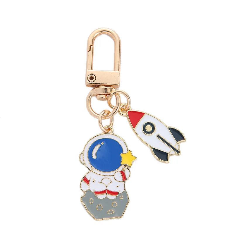 Wholesale Cartoon Lovely Astronaut Rocket Widget Ornaments Key Chain ...