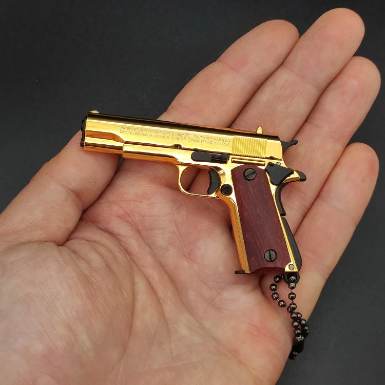 Alibaba.com: Metal toy gun pistol keychain with realistic bullets ...