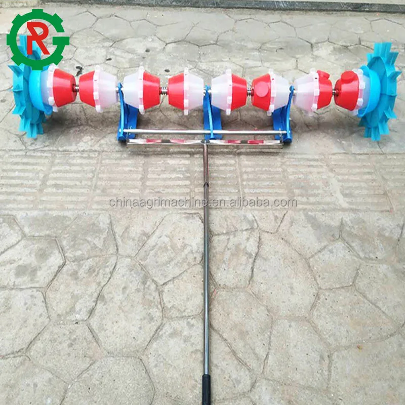 Hand Push Paddy Planter/rice Planting Machine/rice Seeder - Buy Paddy ...