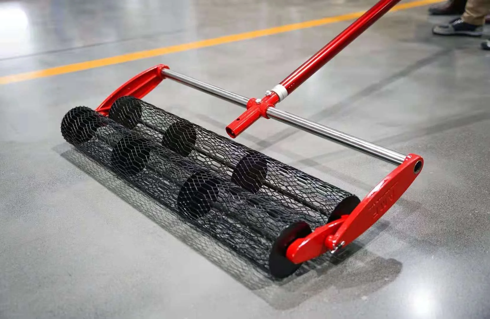 Efficient Stamped Concrete Tamping with AMF Tools Roller