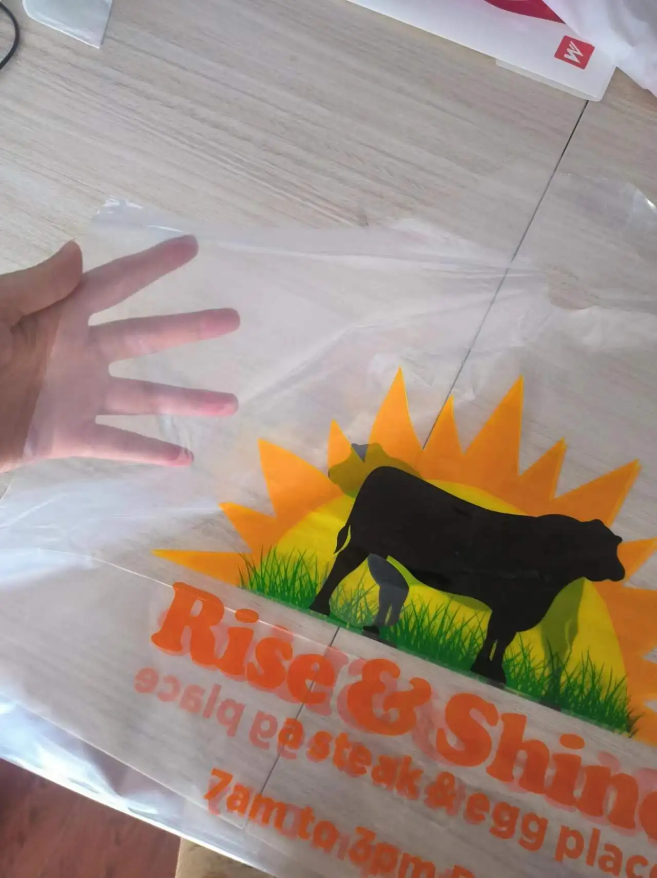 High Quality Transparent Plastic Wave Top Bag with Die-Cut Handle