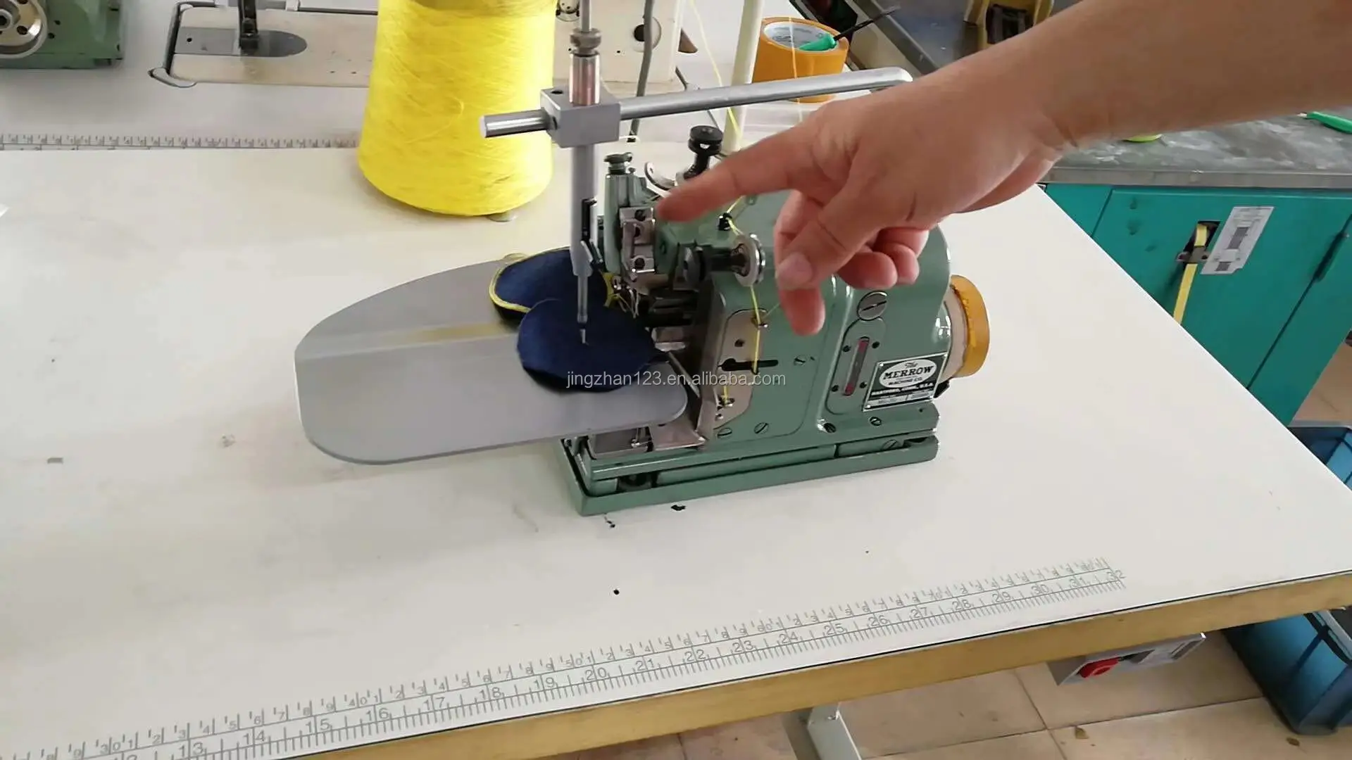 Used Merrow MG-3U Overlock Stitch Sewing Machine with Table | Wholesale
