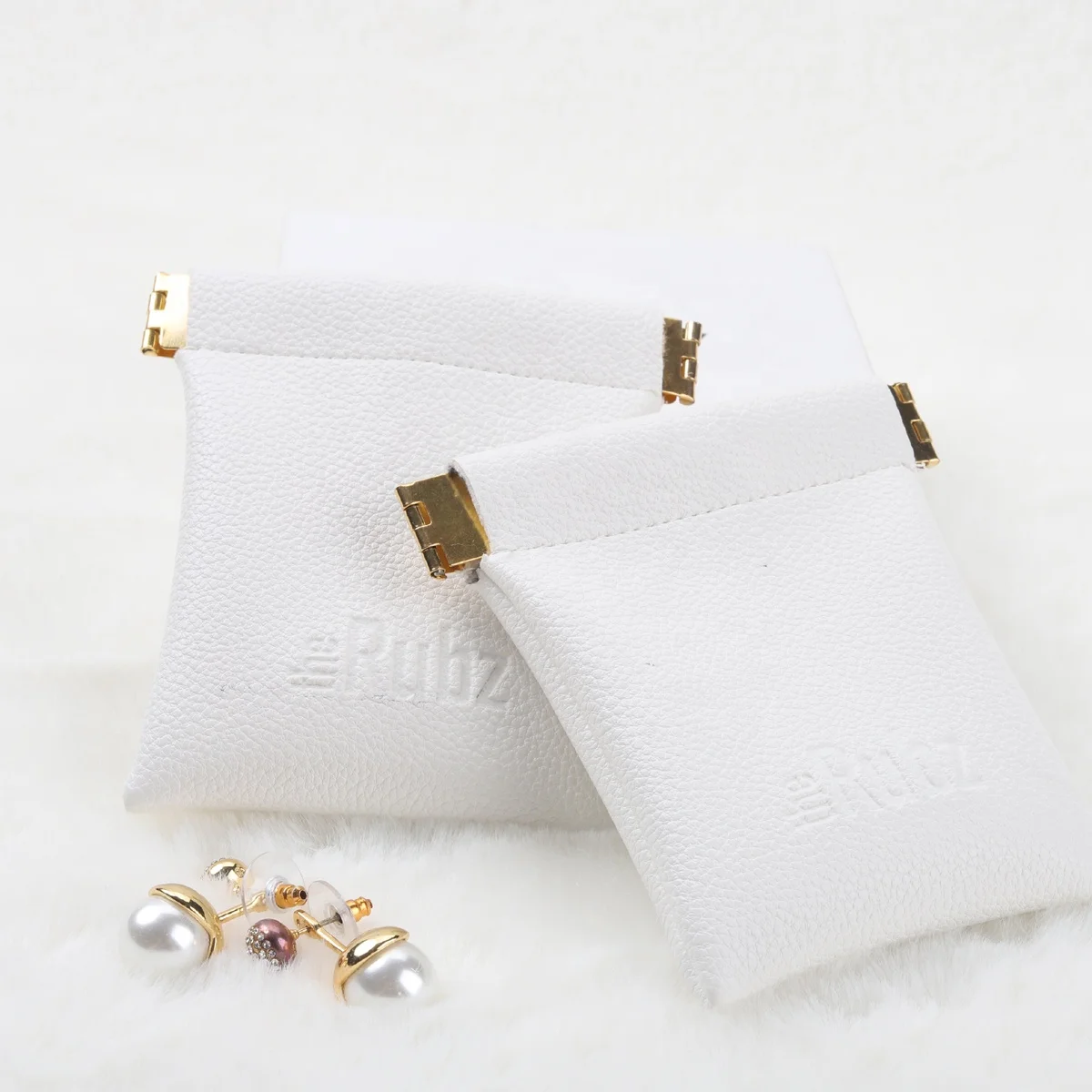 Custom Emboss Logo 7 X 9 Cm Luxury Soft PU Leather Bag