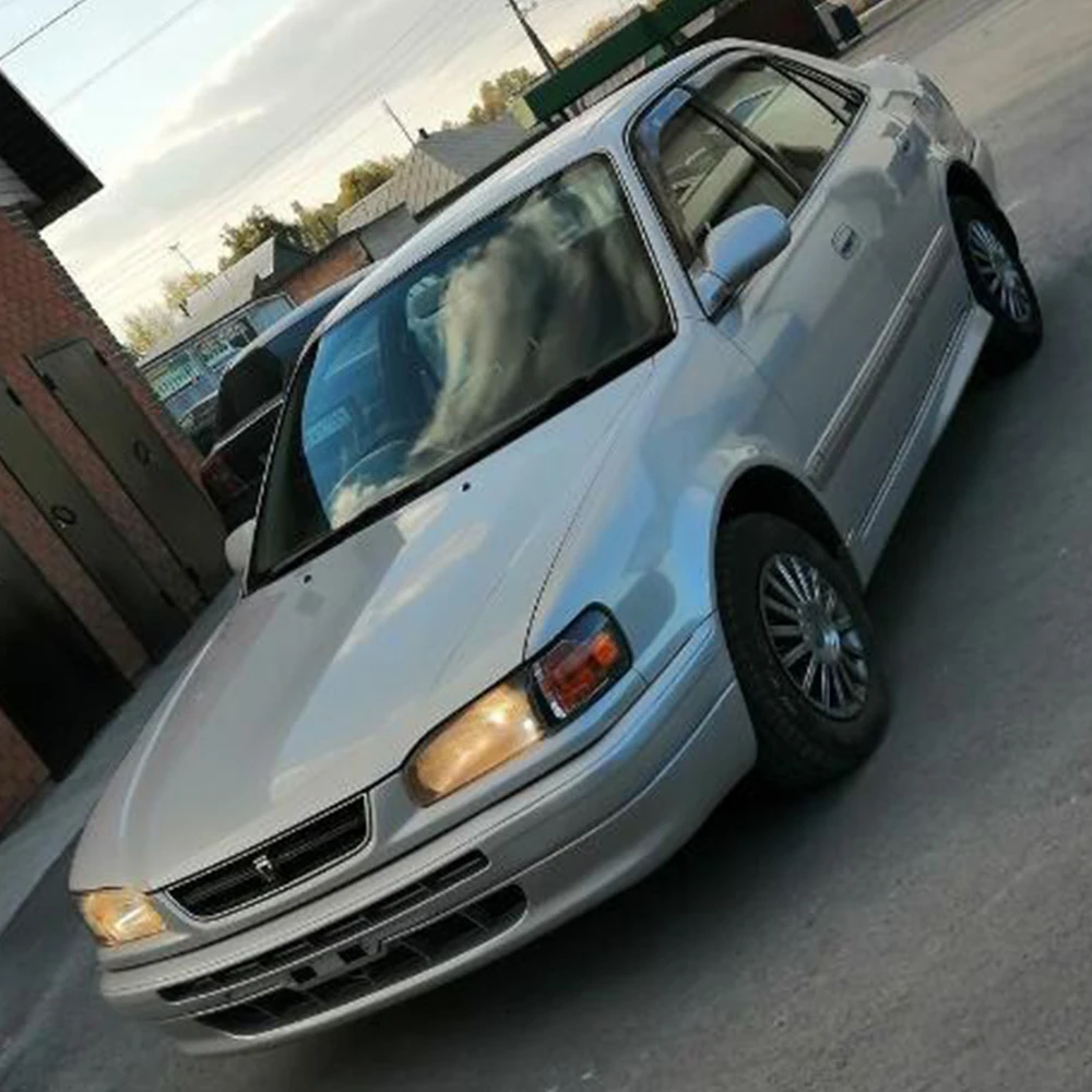 Toyota Corolla 1995-1997 Black Front Headlight Pair - Replacement & OEM