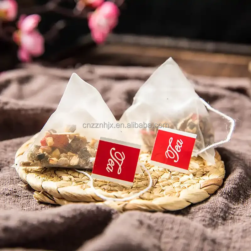 Automatic Triangle Pyramid Tea Bag Packing Machine by NUOHUI