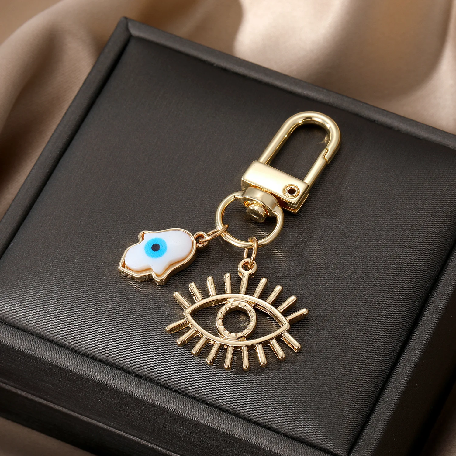 Alibaba.com: Small Retro Gold Round Eye Enamel Metal Key Chains with ...
