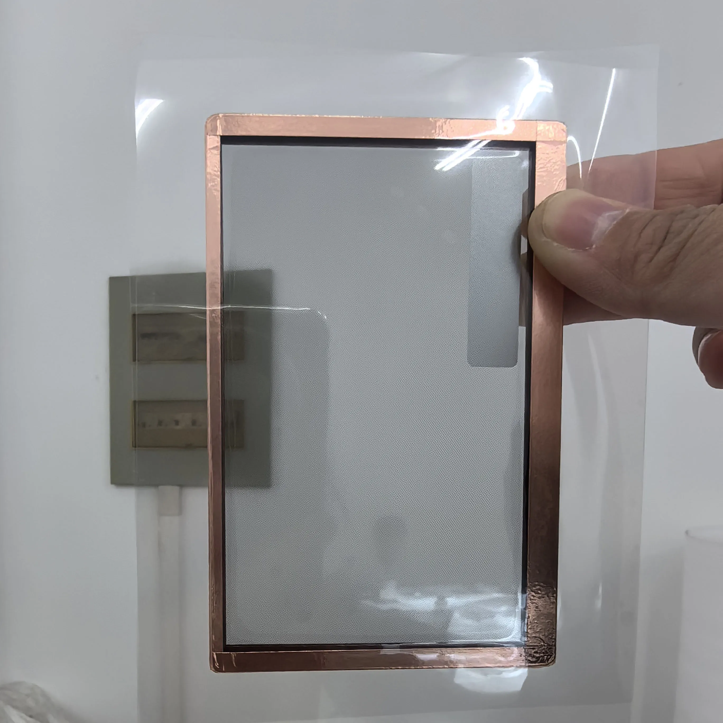 Transparent EMI-shielding Foil with Copper Edges for Grounding RFI ...