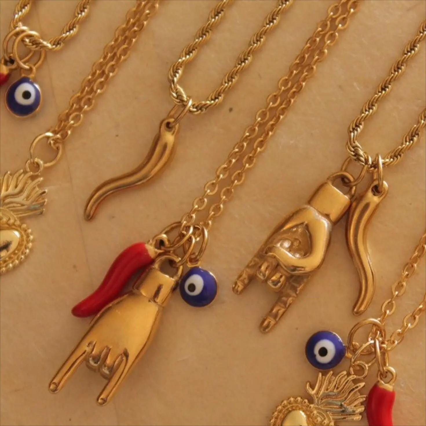 Alibaba.com: Stainless Steel Gold Plated Evil Eye Hand Italian Horn ...