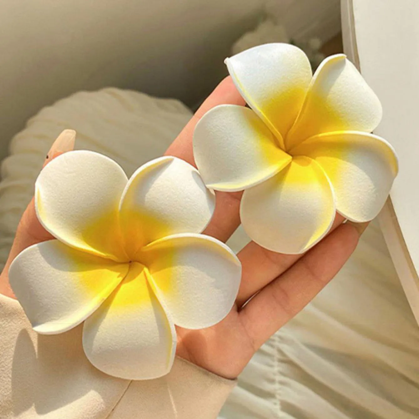Yellow flower hair clip store