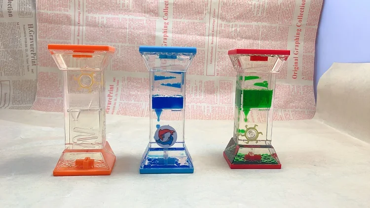 Acrylic Water Floating Liquid Oil Hourglass Timer by Xinbaohong