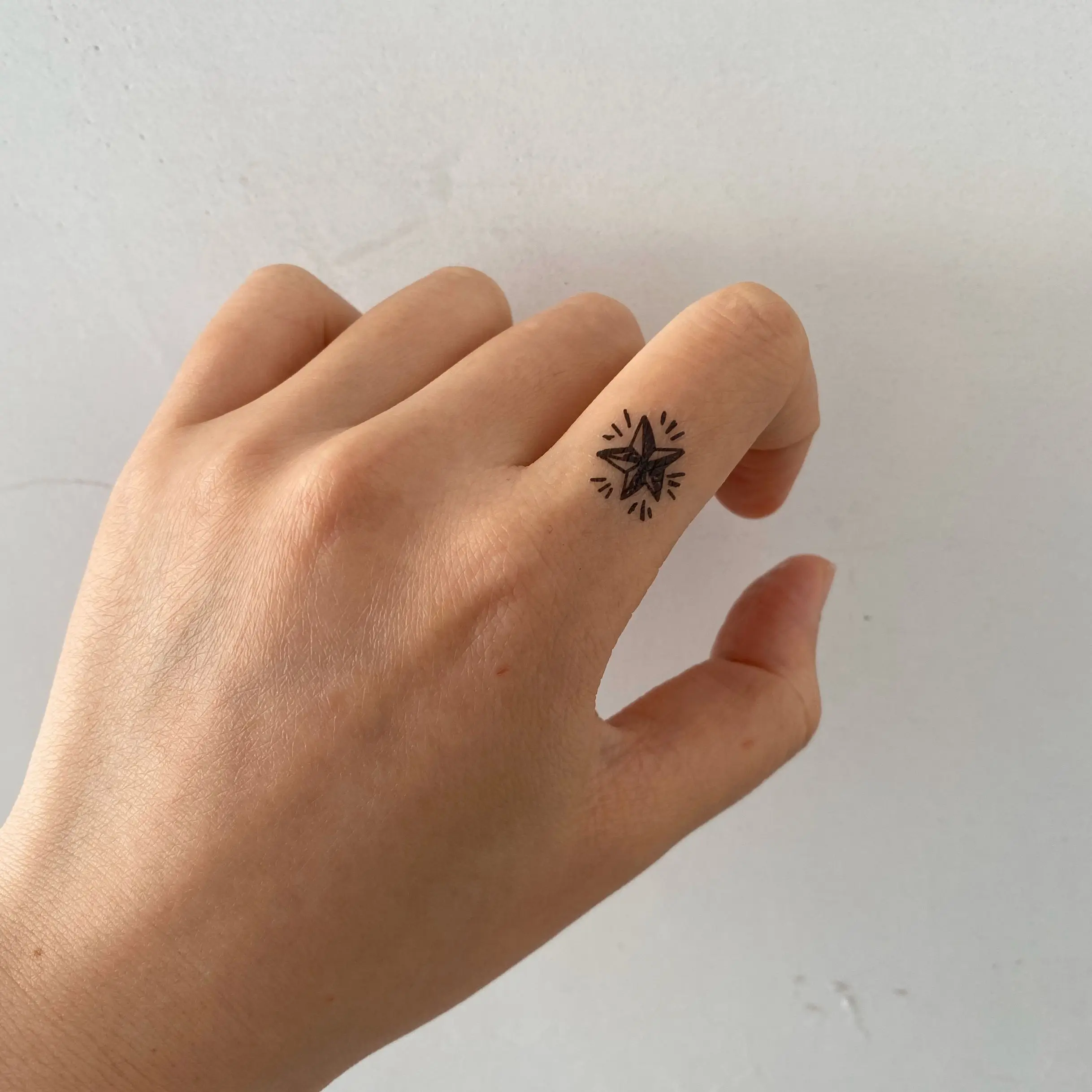 Snowflake Tattoo Finger