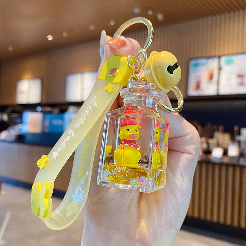 Cartoon Acrylic Floating Into Oil Liquid Quicksand Key Chain Creative ...