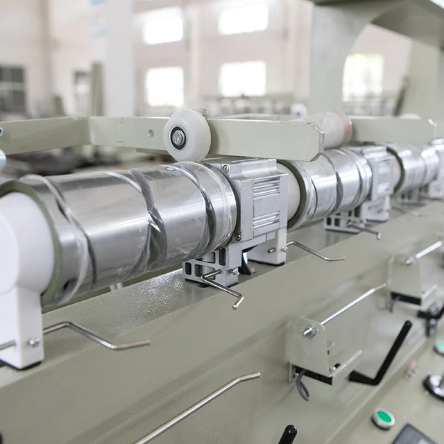 Wuxi Xindawei Textile Machinery Co., Ltd. - Winding Machine, Grooved Drum