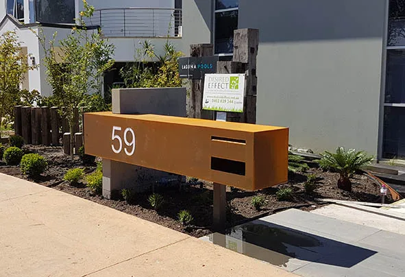 Customizable Rusty Red Steel Mailbox for Outdoor Use & Garden