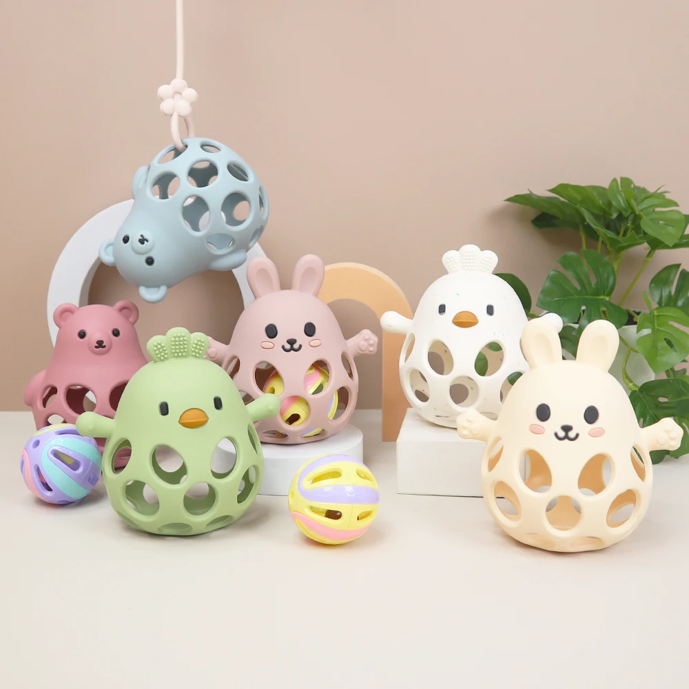 Alibaba.com: Wholesale food grade silicone baby teether rattle, hollow ...