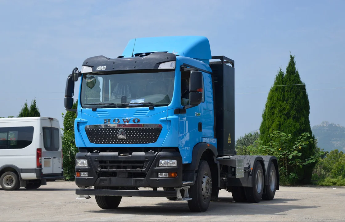 Chinese Powerful Ev Heavy Truck Cnhtc Howo Tx Electric Tractor Truck ...