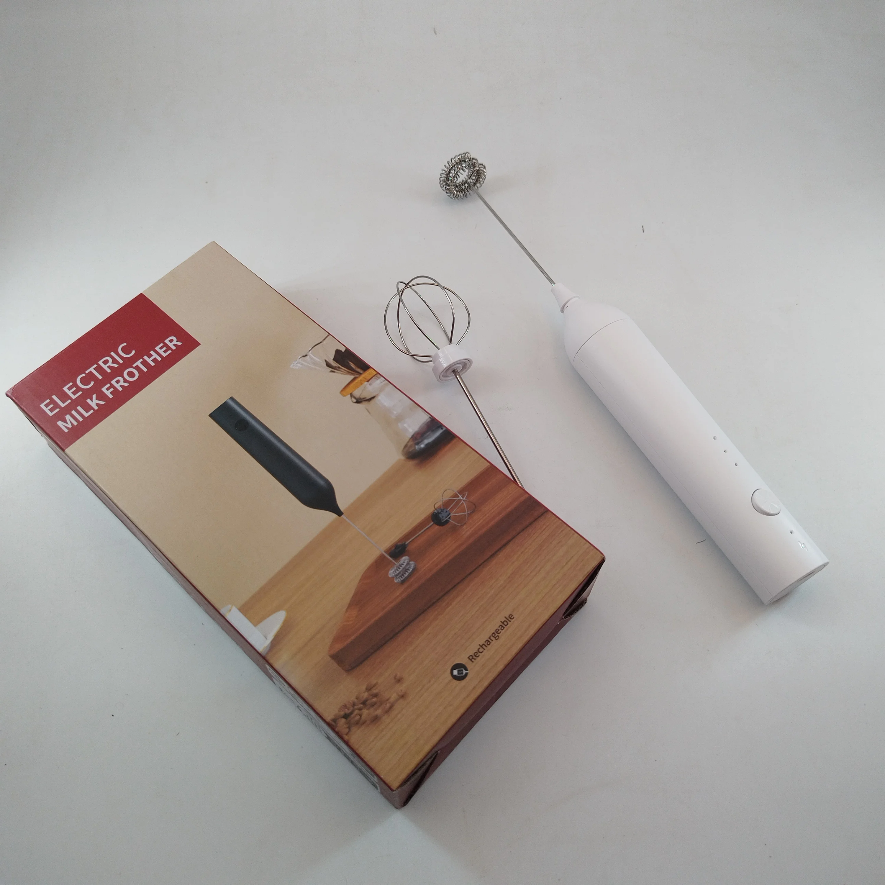 A Portable Hand-Held Electric Milk Mixer Mixes Drinks Stirrer Automatic ...