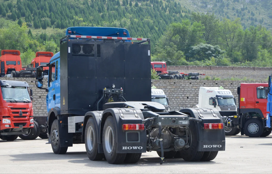 Chinese Powerful Ev Heavy Truck Cnhtc Howo Tx Electric Tractor Truck ...
