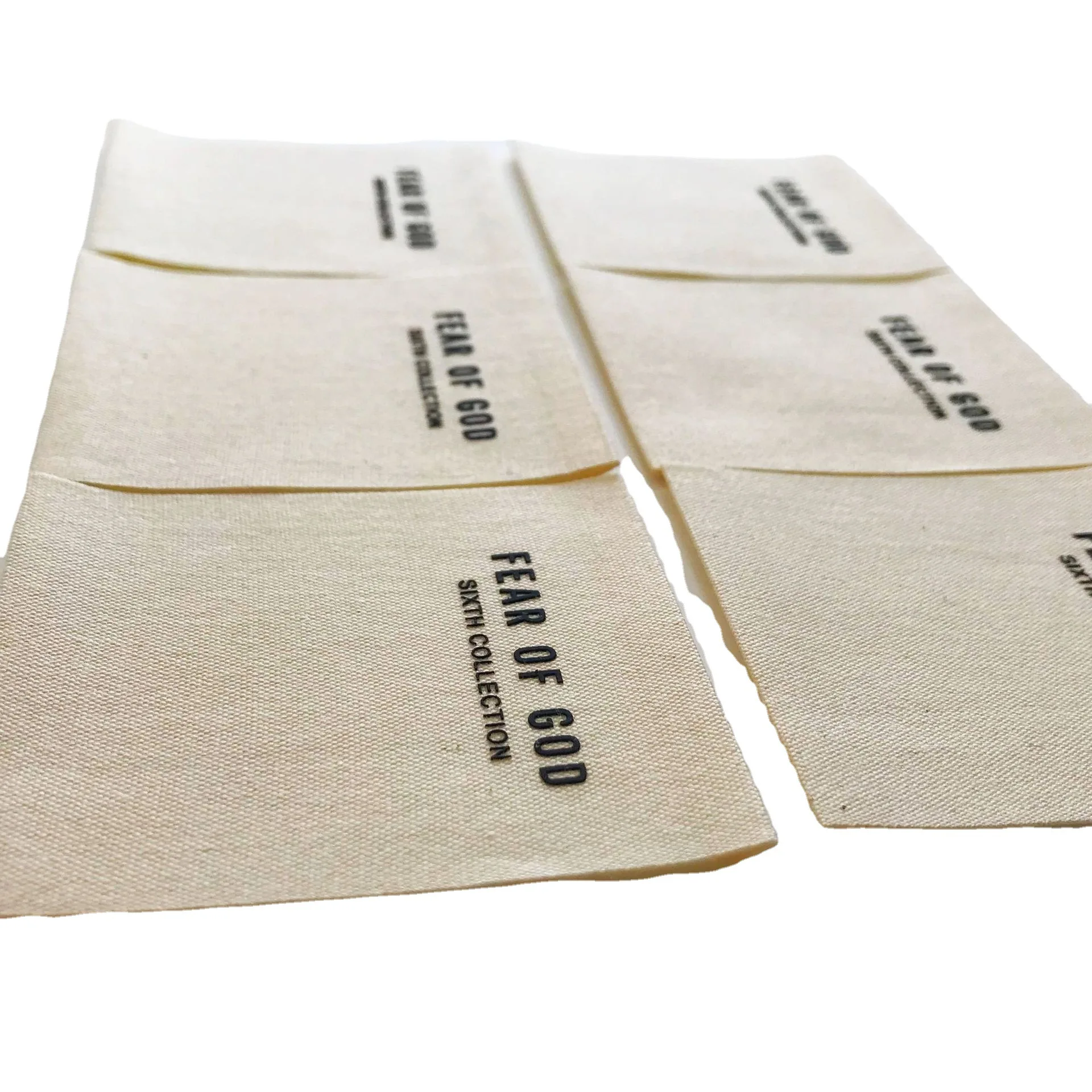 Custom Clothing Labels - Beige Fabric Label with 3D Silicone Print