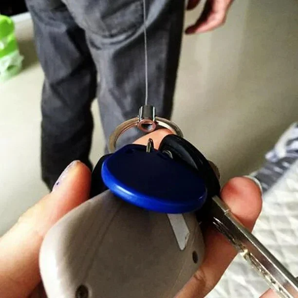 Retractable Steel Cord Pull Reel Keychains - Fashion & Utility