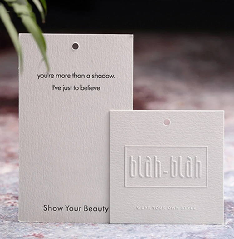 Embossed Etiketter - Customized Clothing Tags for Brands