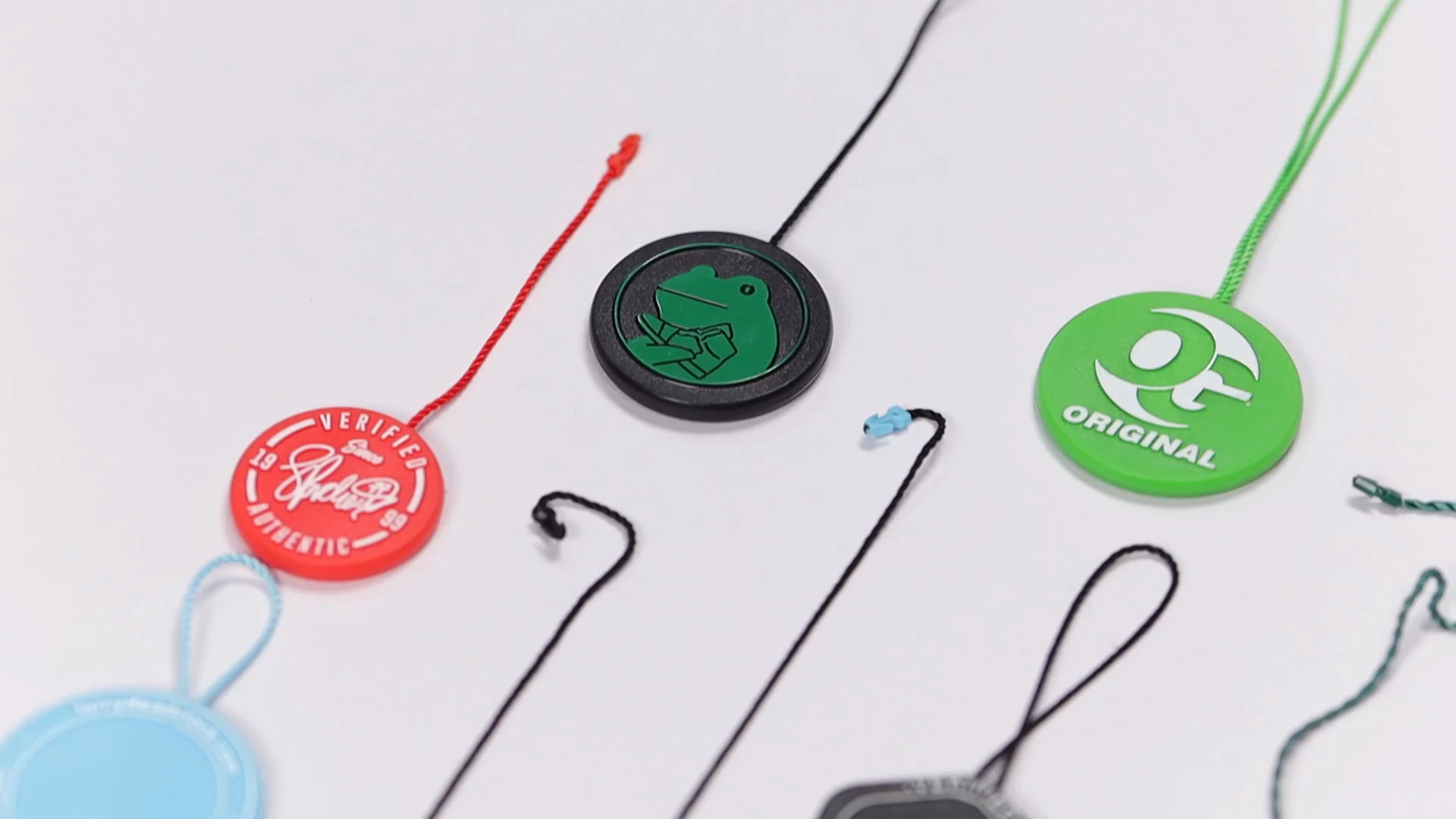 Custom Embossed Logo Black Plastic Nylon Hang Tag String For Garment ...