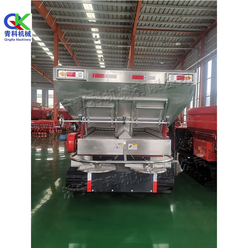 Sprinkling Farm Manure With Tracked Car With Power Rice Field ...