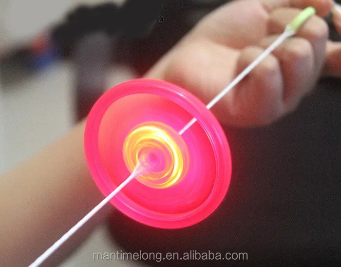 Large flash cable gyro flywheel wind whistle button light sounding toys ...