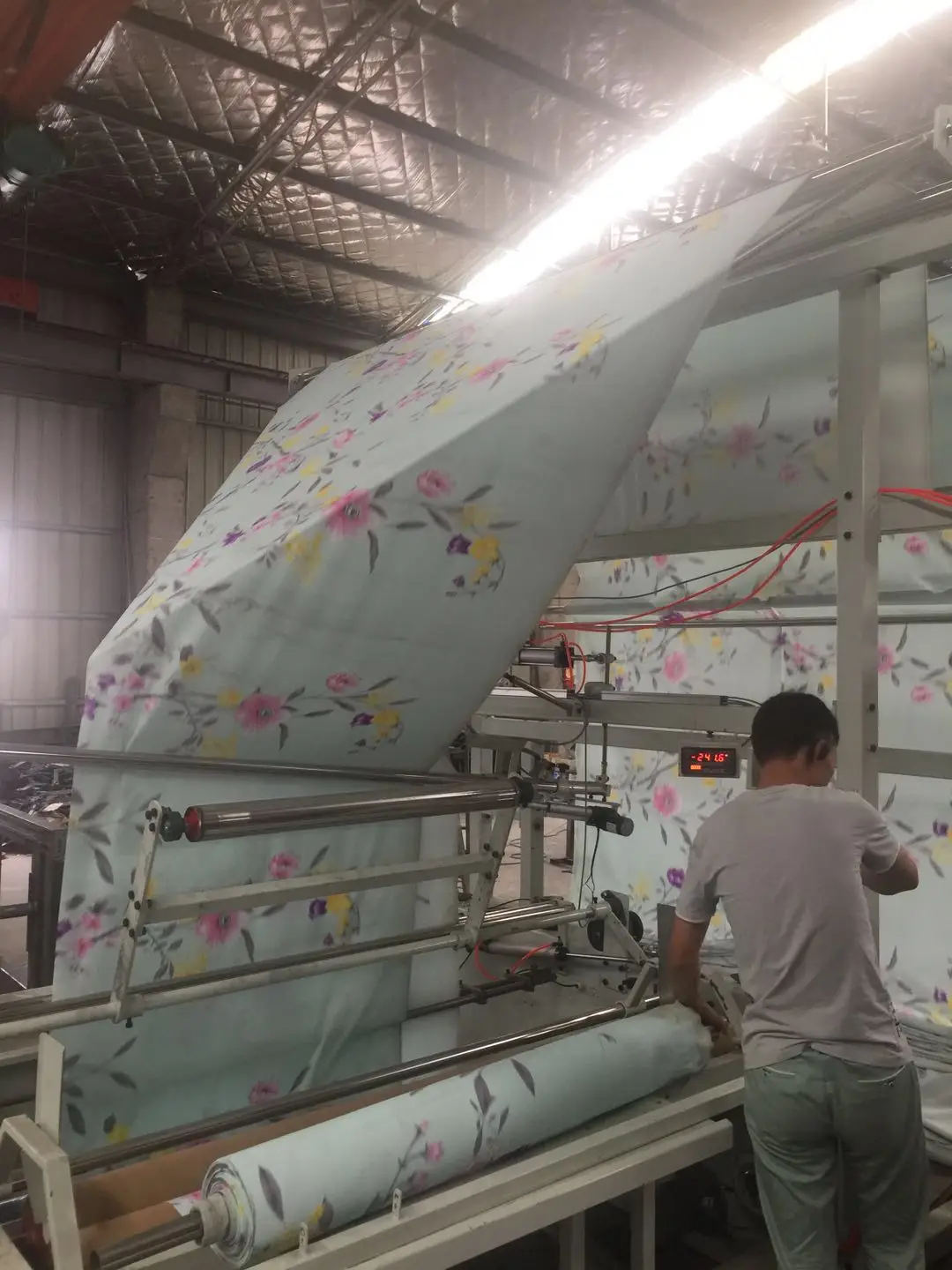 Efficient Textile Finishing with Automatic Double Rolling Machine