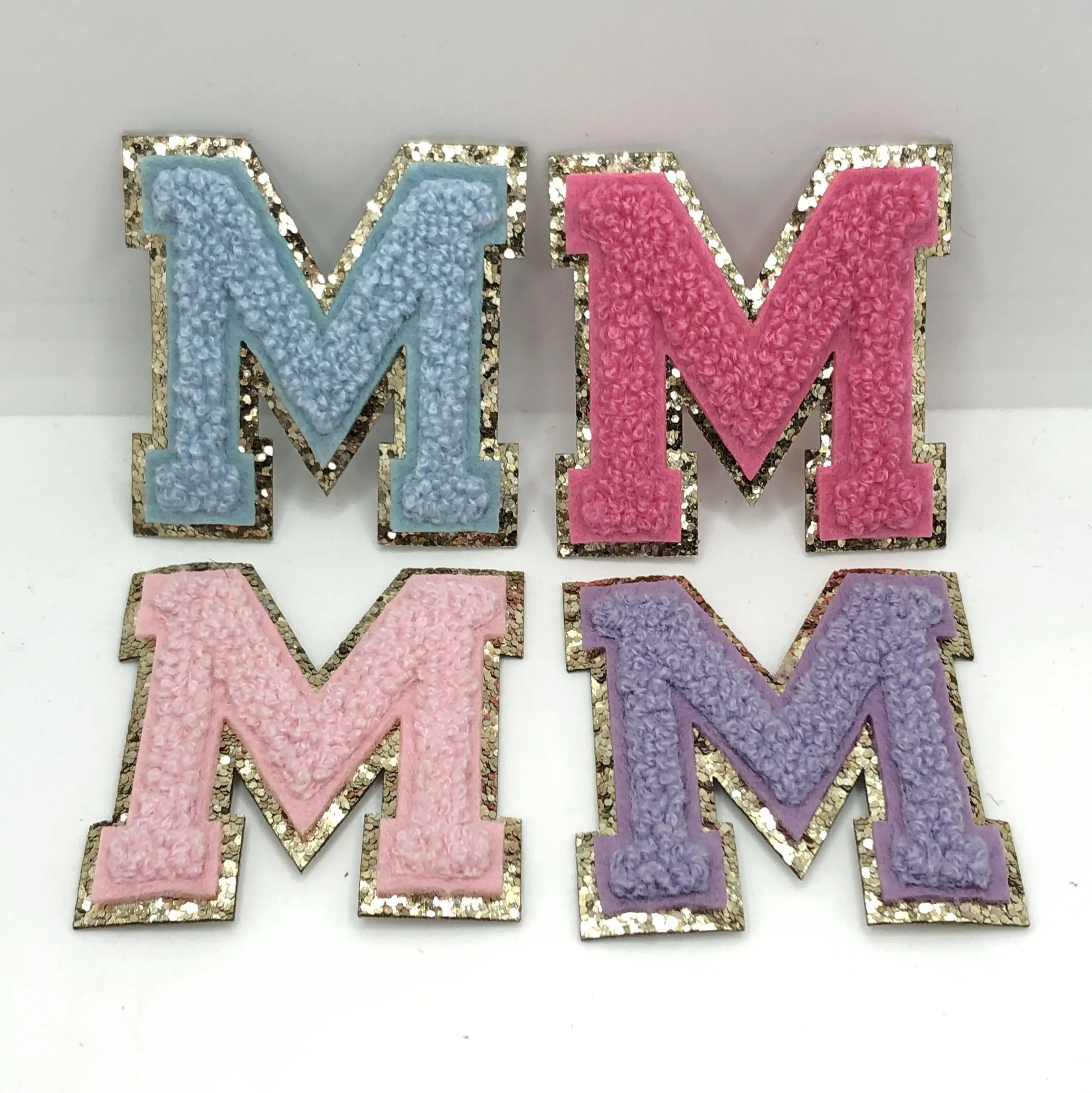 The Letter M In Pink Glitter