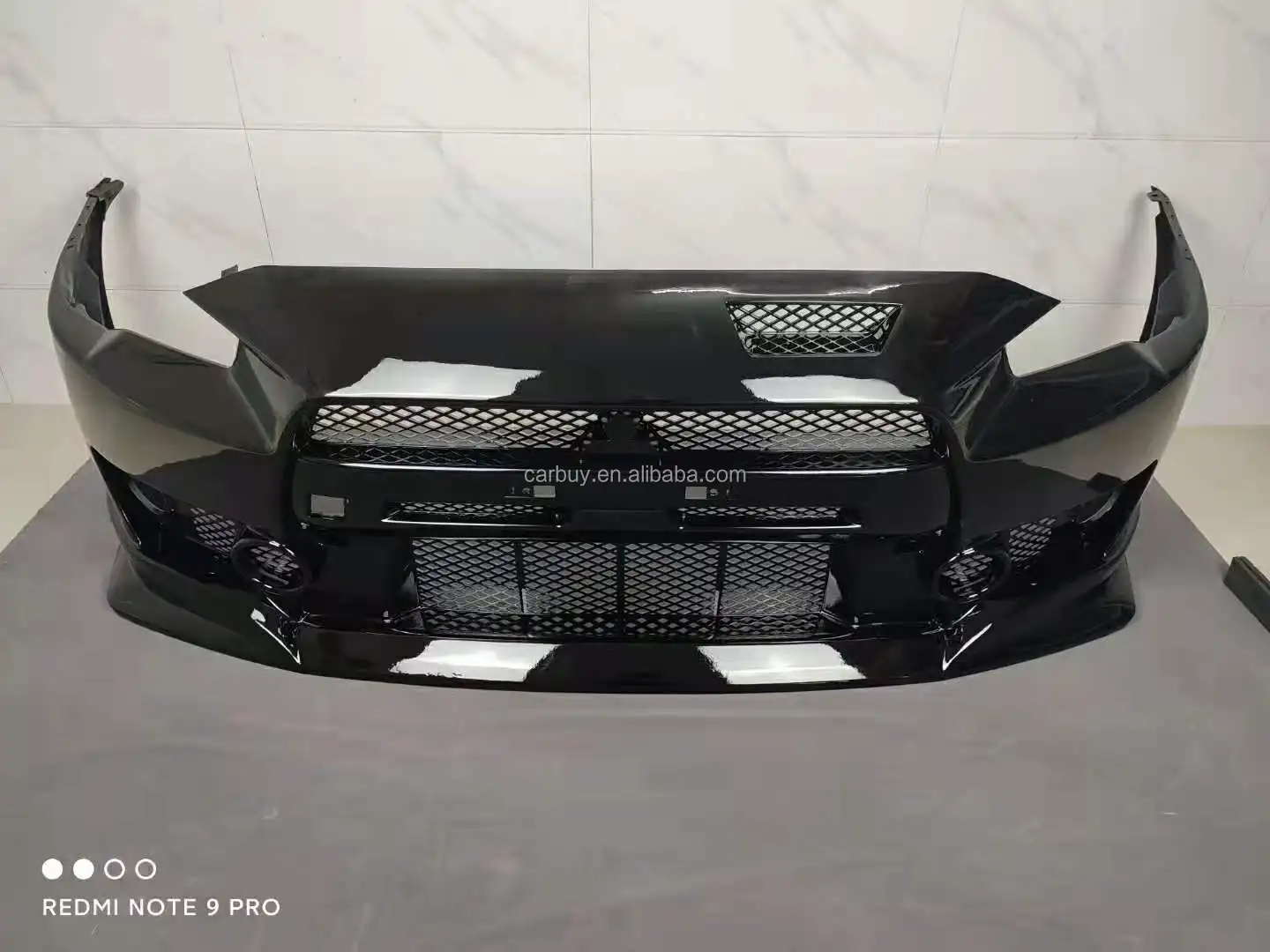 FQ400 Style Front Bumper for 2009-2015 Mitsubishi Lancer | Aftermarket ...