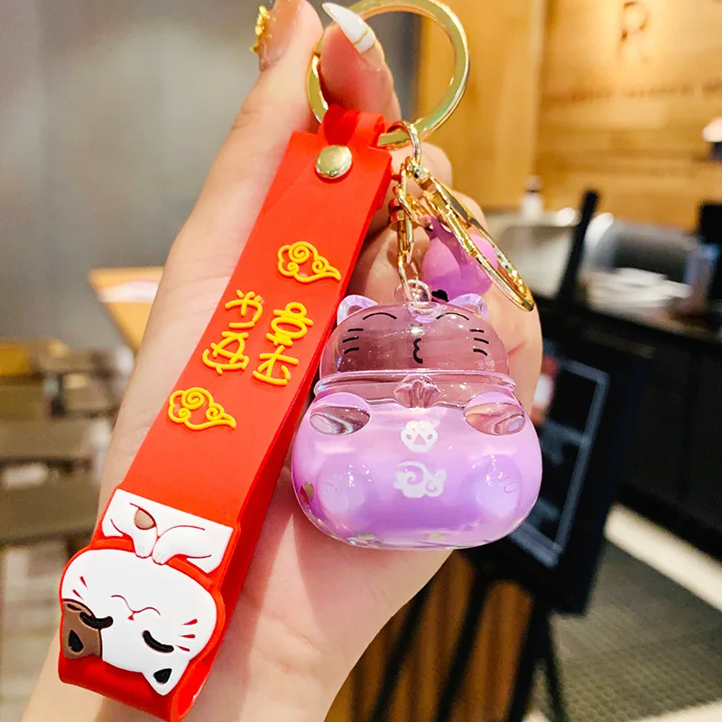 Creative Lucky Cat Transparent Floating Bottle Liquid Keychain Female ...