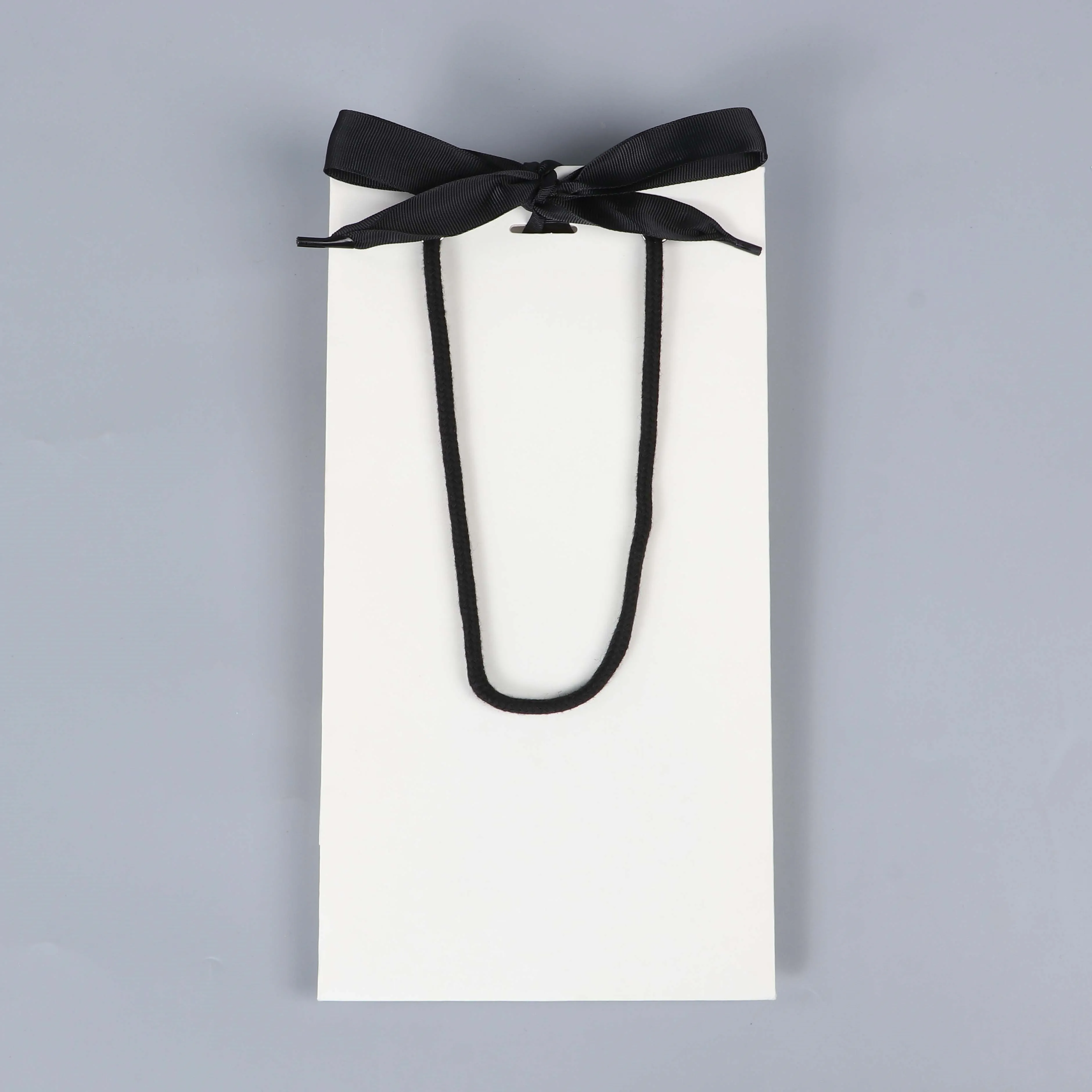 Sturdy Durable Thick White Gift Bag With Black Handle And Ribbon ...