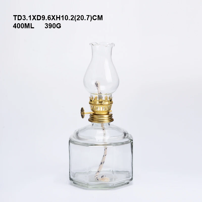 Old fashion empty glass oil lamp glass lantern with burner and wicks ...