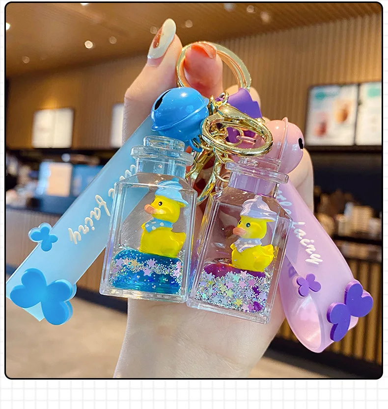 Cartoon Acrylic Floating Into Oil Liquid Quicksand Key Chain Creative ...