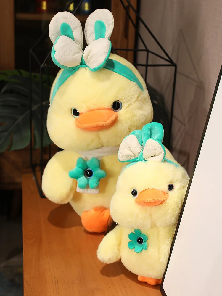 Alibaba.com: Soft Cute Rubber Duck Doll Turned Into Rabbit Plush Toy ...