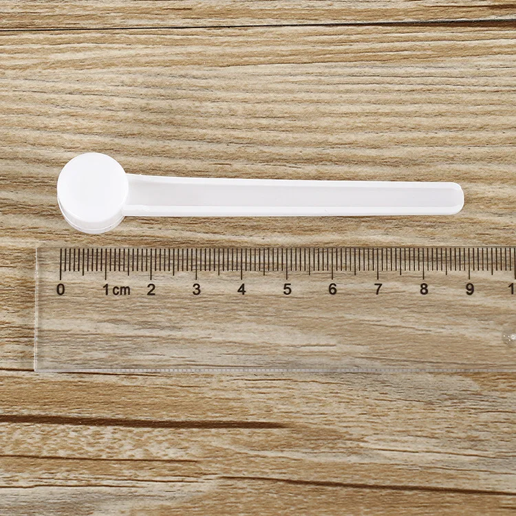 1g 2ml Disposable White Plastic Spoon - Sustainable & Stocked