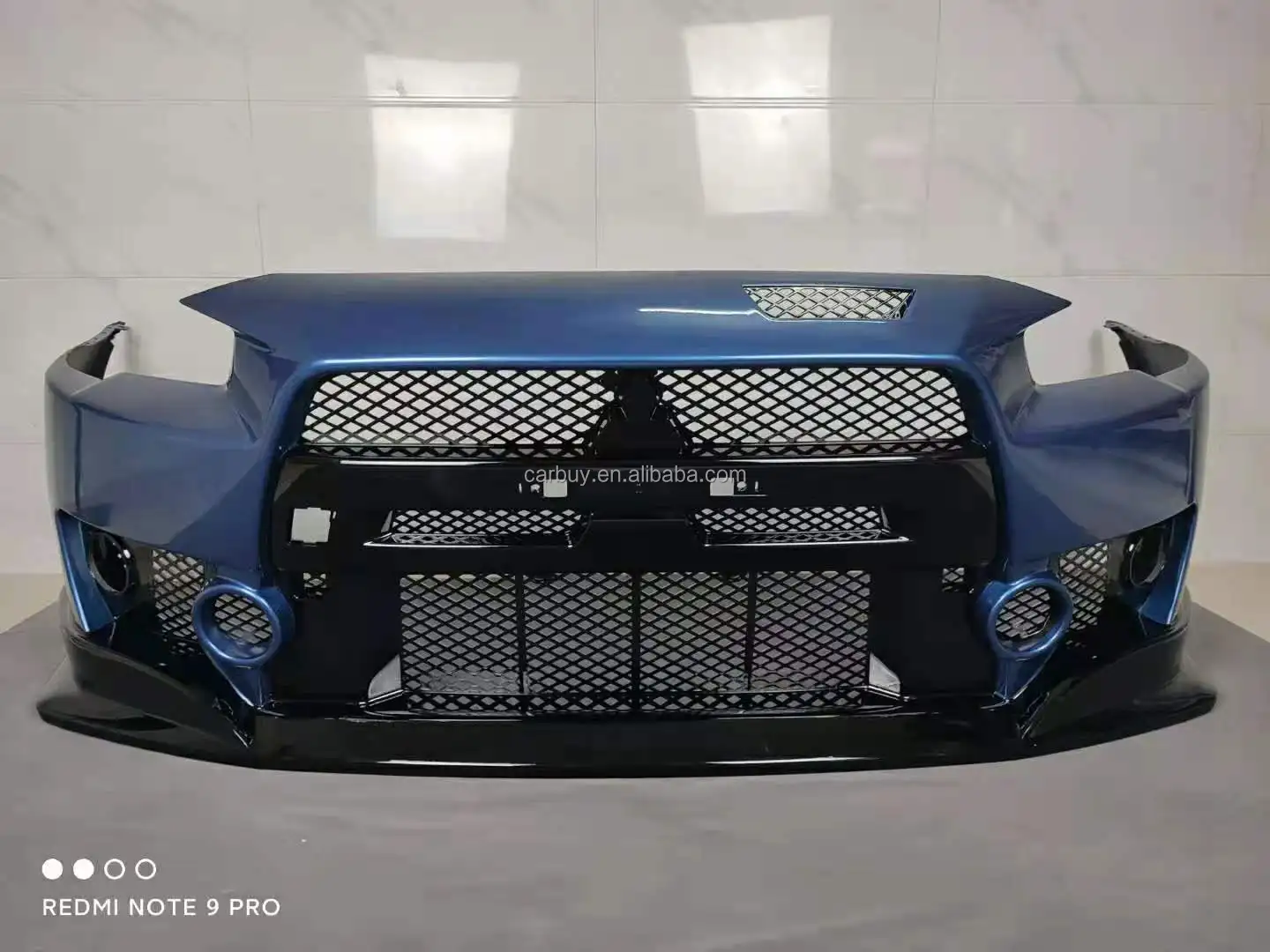 FQ400 Style Front Bumper for 2009-2015 Mitsubishi Lancer | Aftermarket ...
