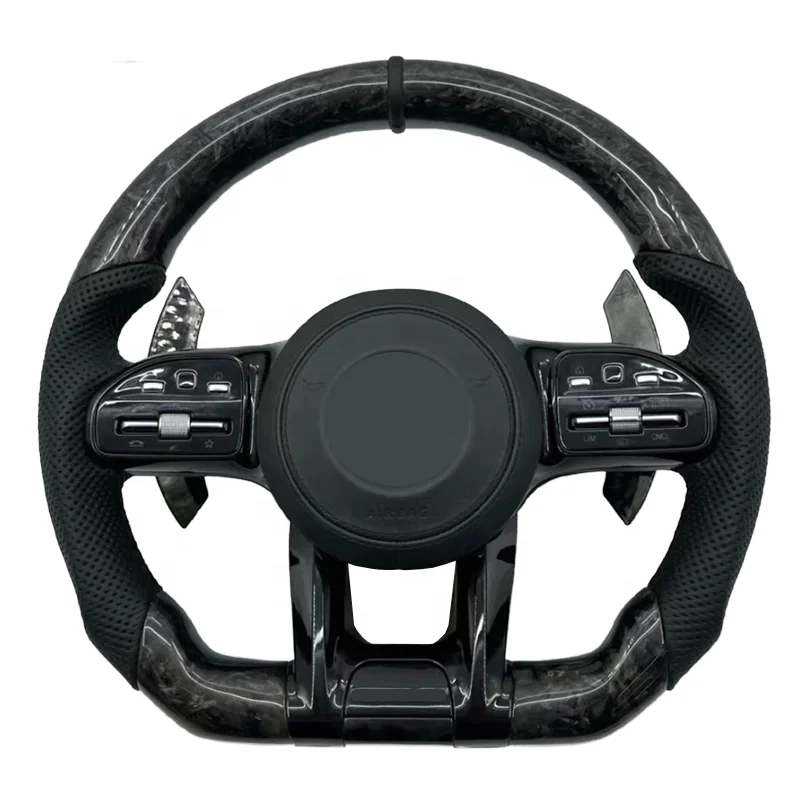 The custom-made AMG carbon fibre steering wheel is used for Mercedess ...
