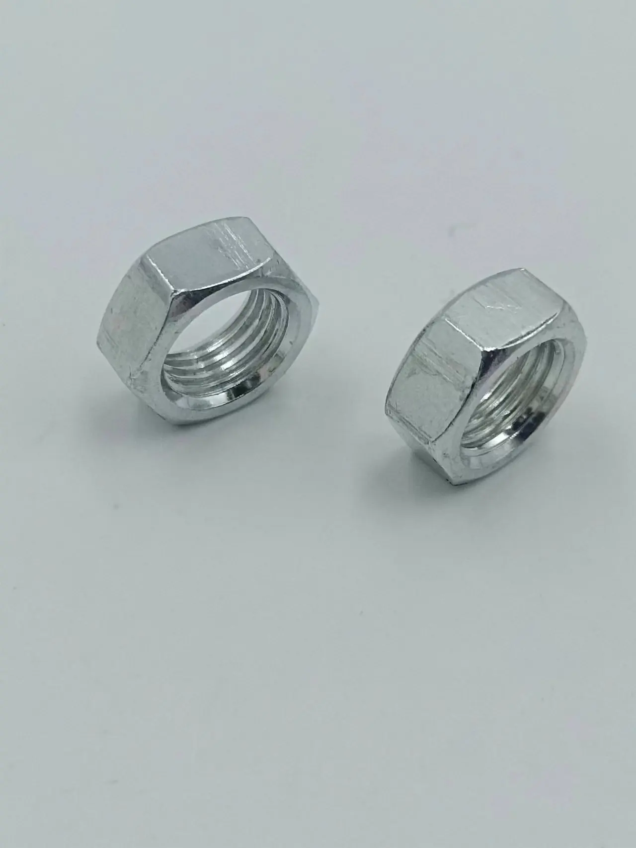 Wholesale M6 M8 M10 Zinc Plated Hex Thin Teeth Nuts Galvanized Standard ...