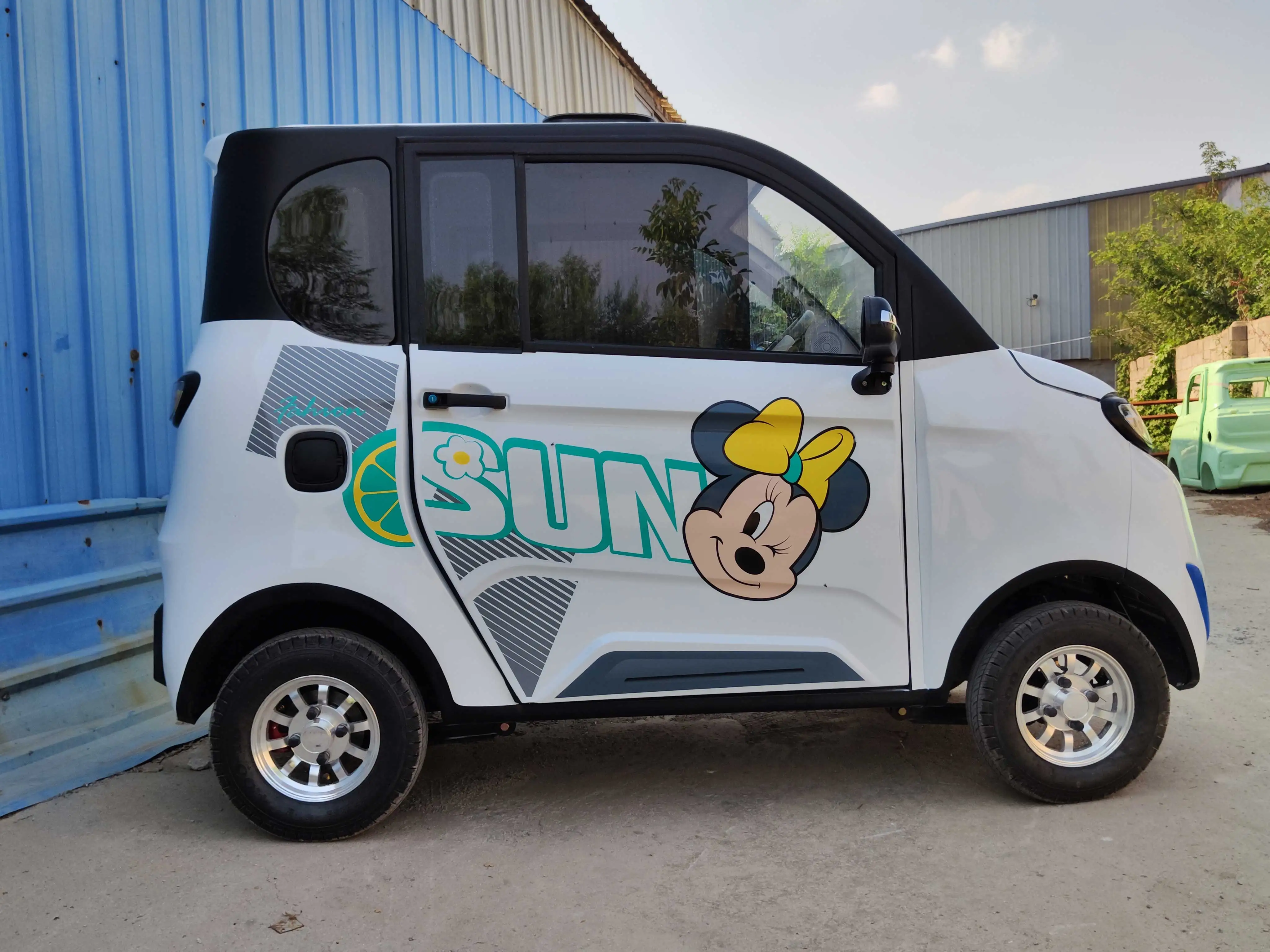 4 Wheel Electric Car with Sunroof & LED Lights - Mobility Scooter Car ODM