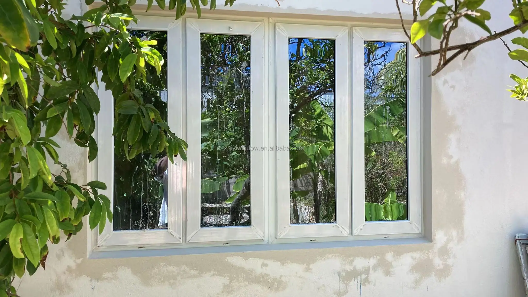Bahamas House UPVC Casement Window - Hurricane Impact Tinted Windows