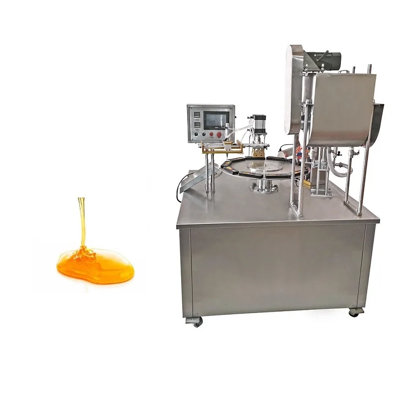 KV High Quality Rotary Honey Spoon Filling Sealing Machine